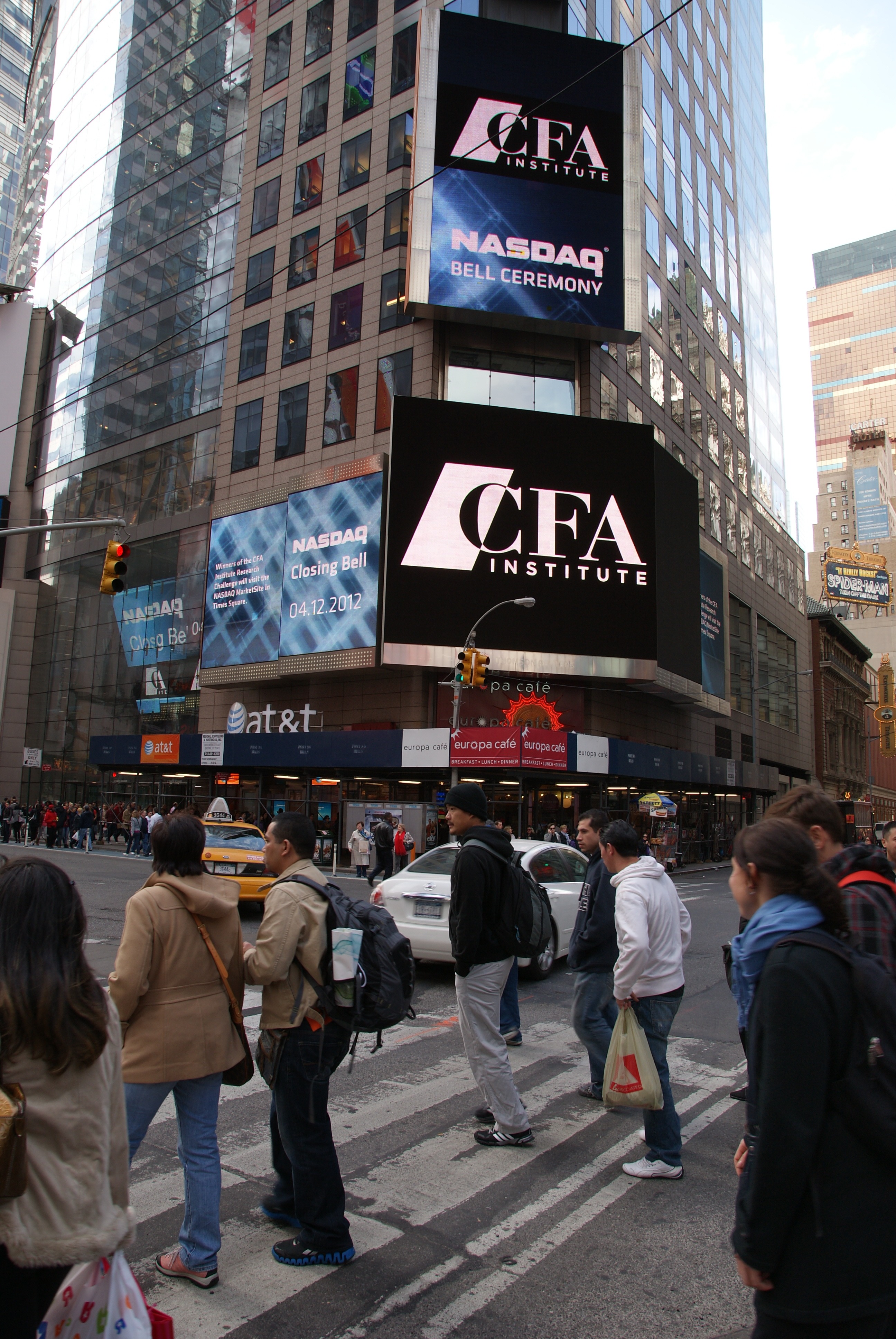 NASDAQ sign on 3 Times Square (Thomson Reuters Building) highlights CFA ...